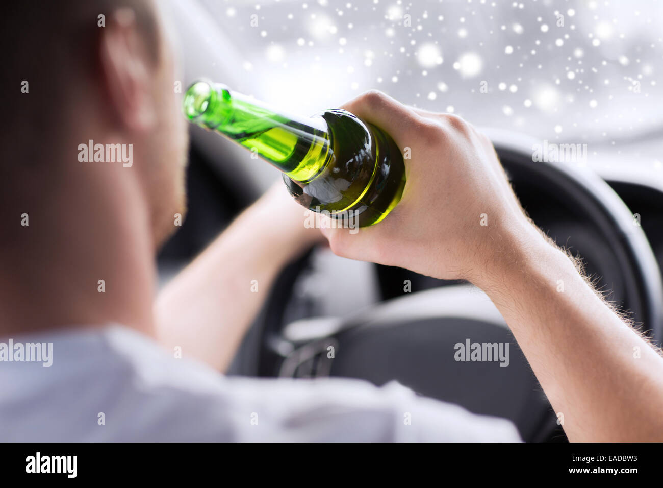 close up of man drinking alcohol while driving car Stock Photo - Alamy