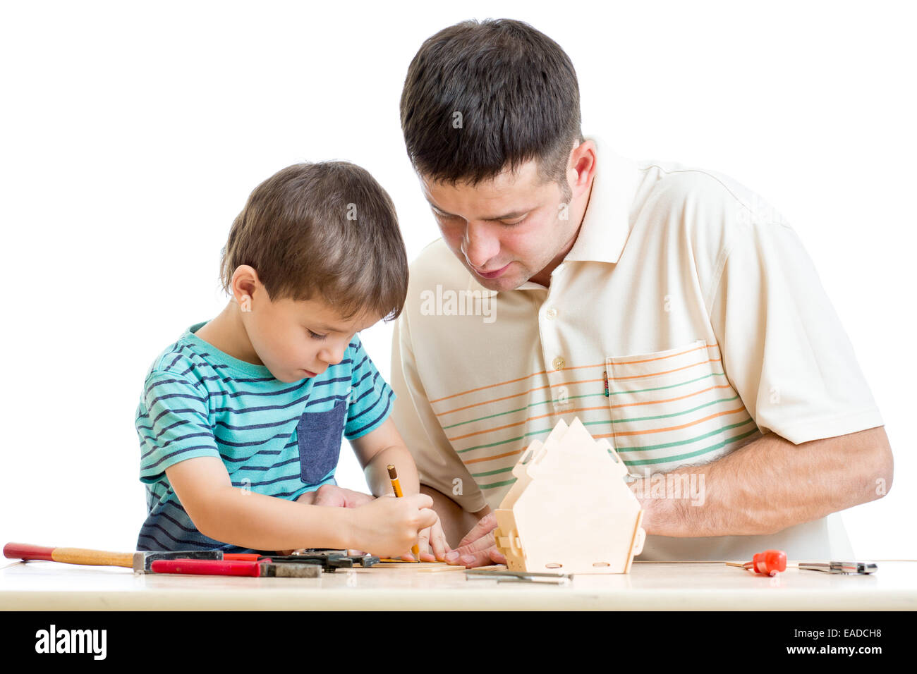Father and son work together Stock Photo - Alamy
