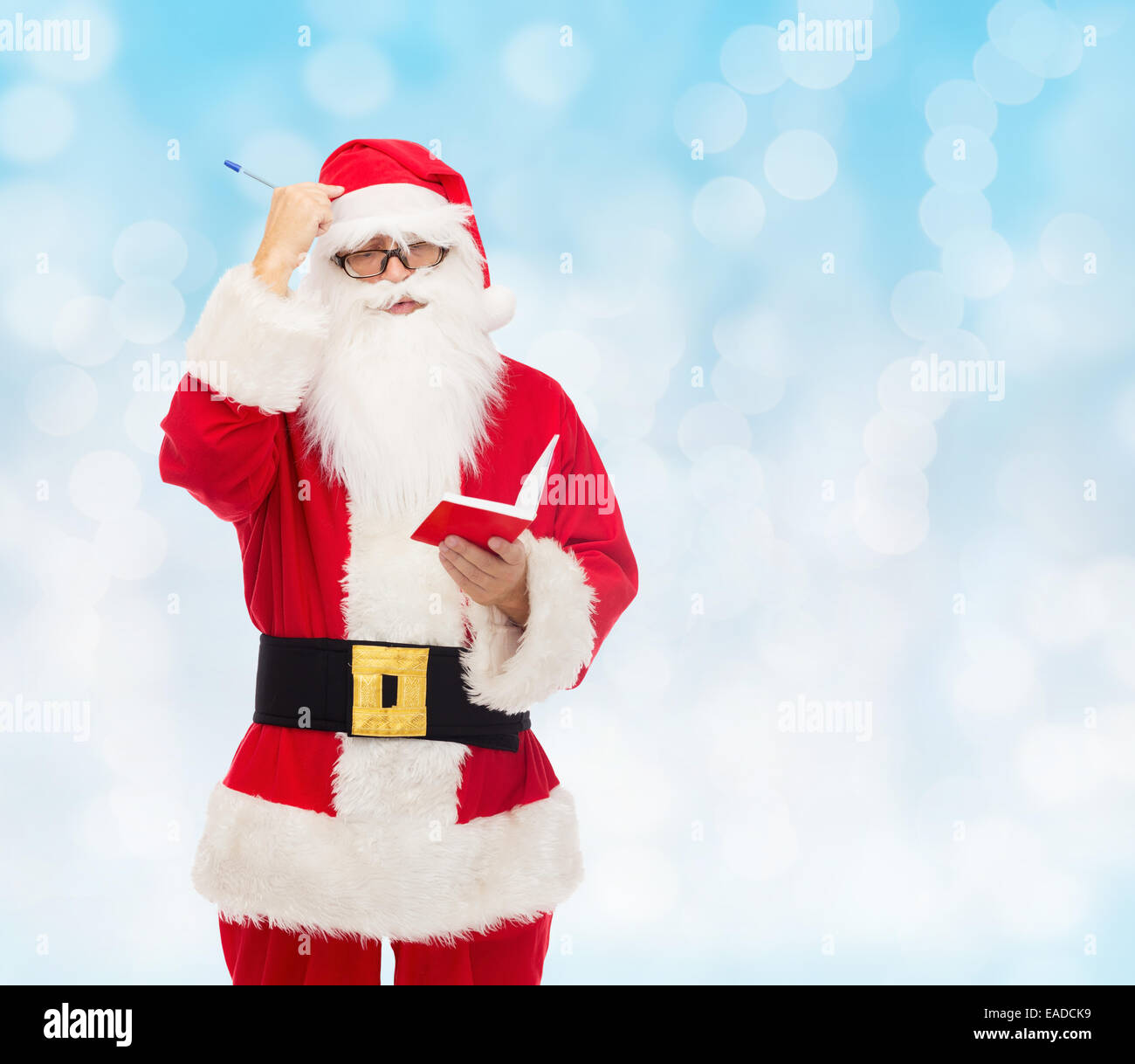 man in costume of santa claus with notepad Stock Photo - Alamy