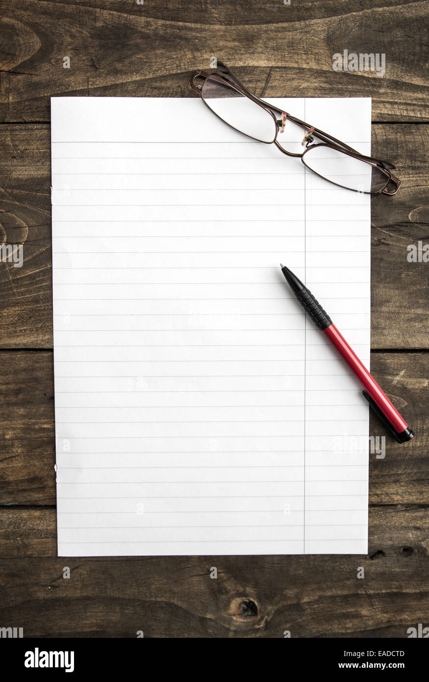 Blank note paper with pen on wood background, from above Stock Photo ...
