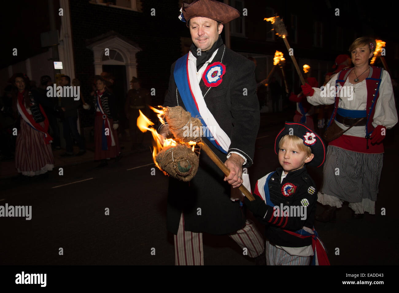Bonfire Night Lewes, Sussex, 2014. A father and son wearing historical ...