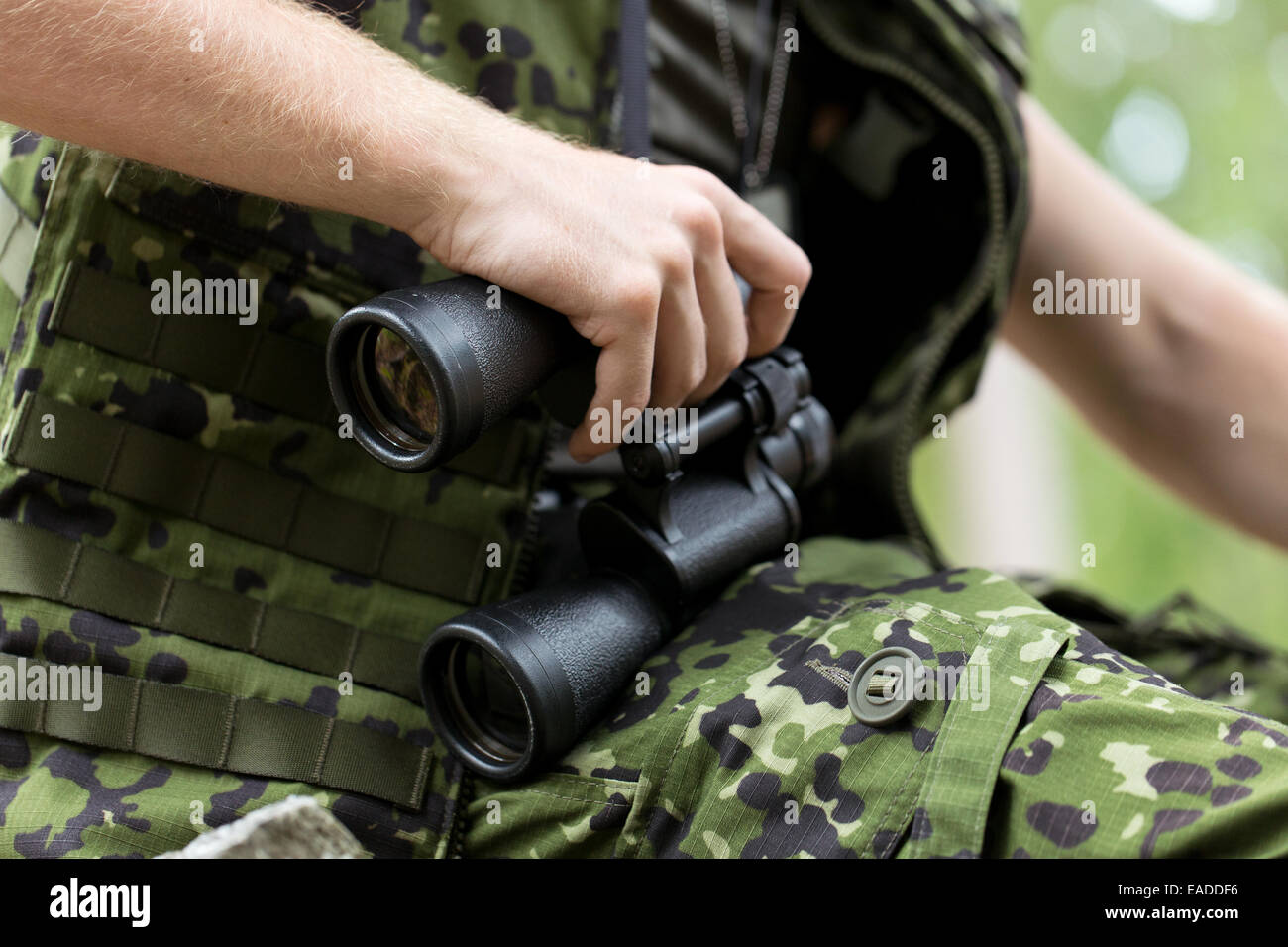 close up of soldier or hunter with binocular Stock Photo - Alamy