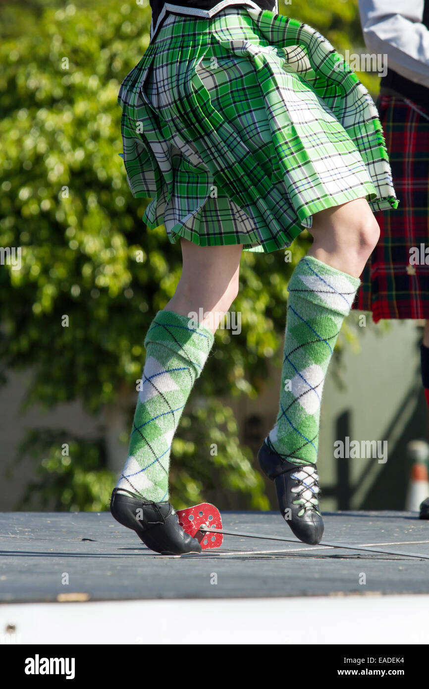 Dancer performing a traditional sword dance routine from the Highland ...