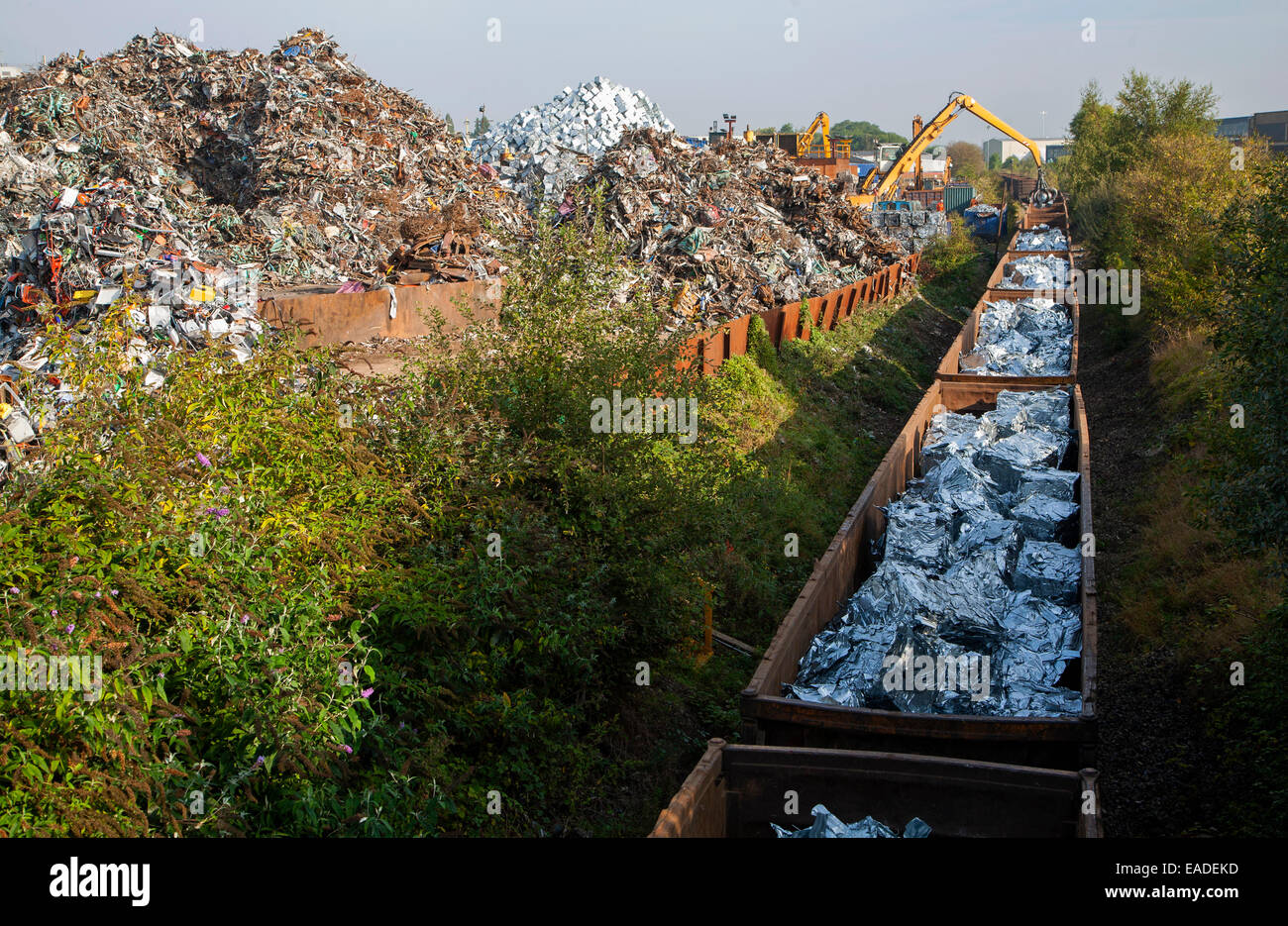 Scrap metal recycling loading train wagons with processed metals hi-res ...