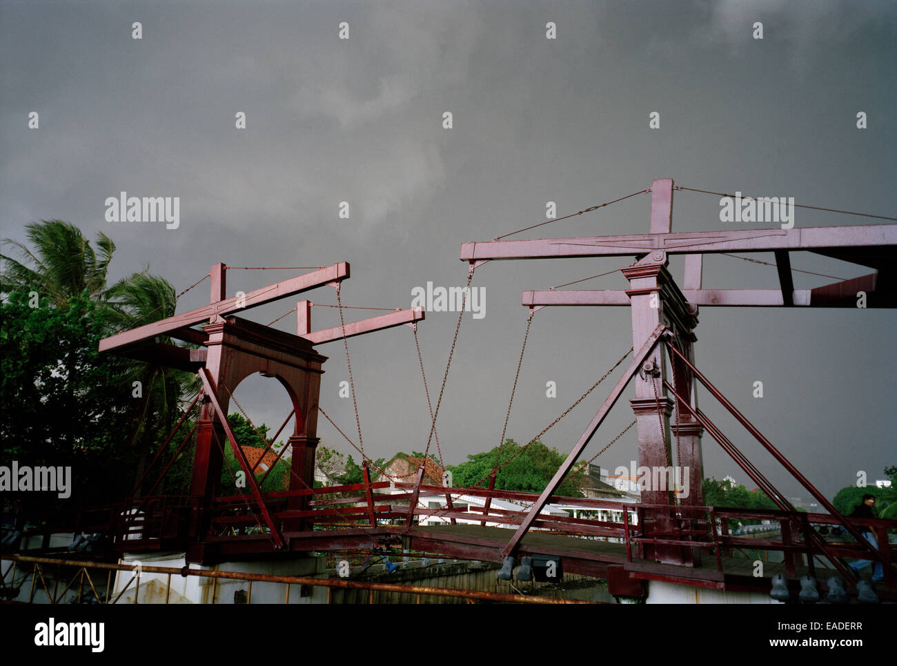 Stormy sky behind the drawbridge Kota Intan Bridge in Jakarta in Java ...