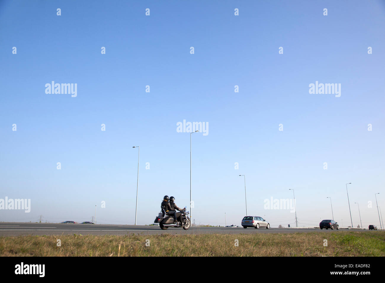 motorbike and cars on dutch highway A2 between utrecht and amsterdam ...