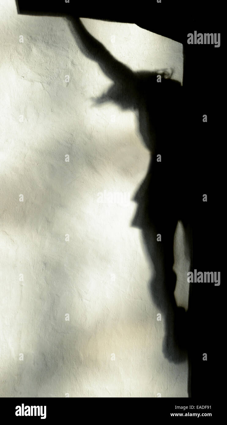 Shadow of Jesus Christ on the Cross Stock Photo - Alamy