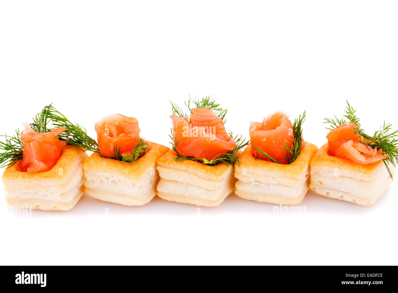 Salmon rolled fillet in pastries isolated on white background Stock ...