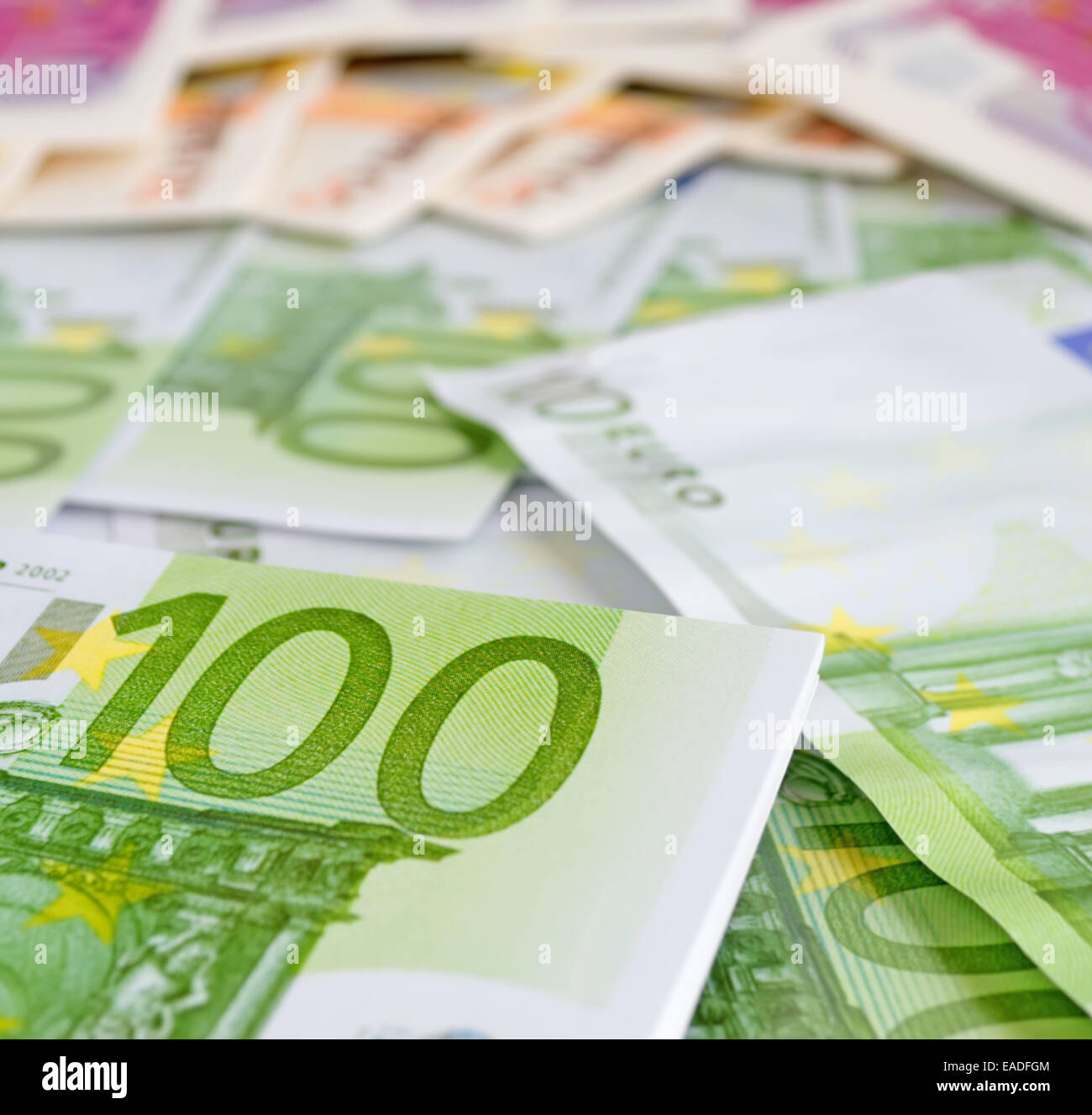 different euro banknotes on a table Stock Photo - Alamy