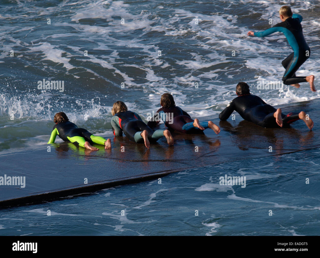 Children playing waves hi-res stock photography and images - Alamy