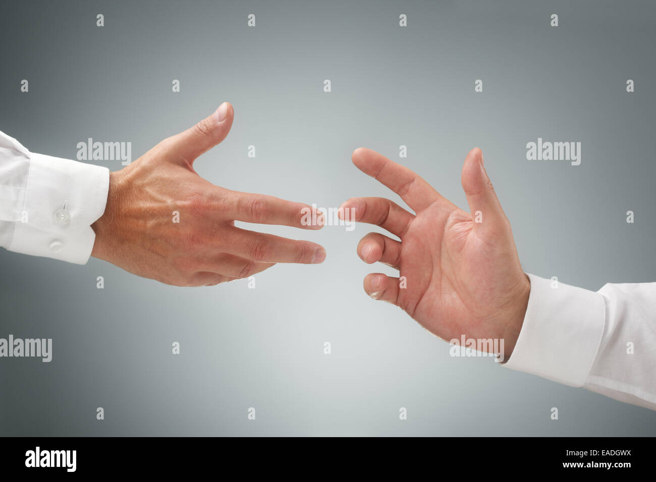 Hand reaching for assistance, support or friendship Stock Photo - Alamy