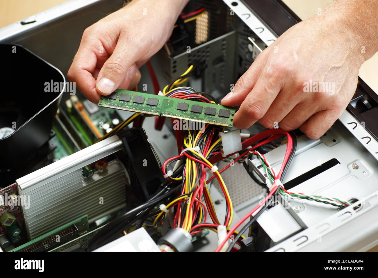 Computer engineer repairing a faulty pc Stock Photo - Alamy
