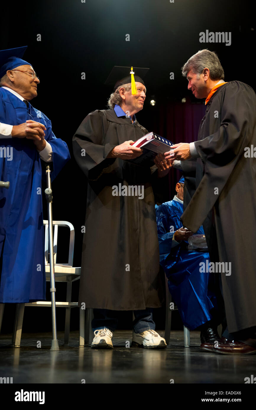 Receiving diploma hi-res stock photography and images - Alamy