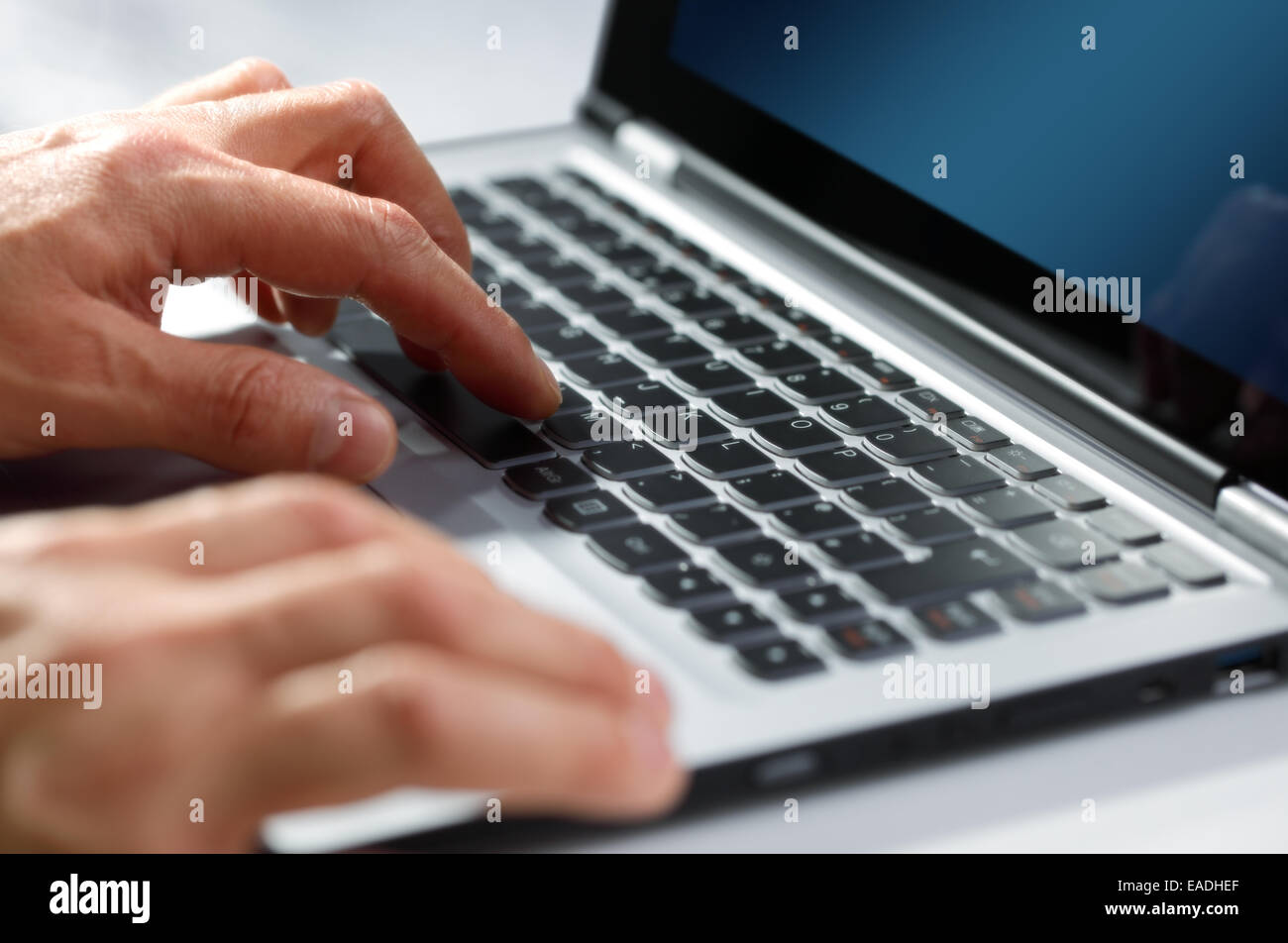 Hands typing on laptop computer Stock Photo - Alamy