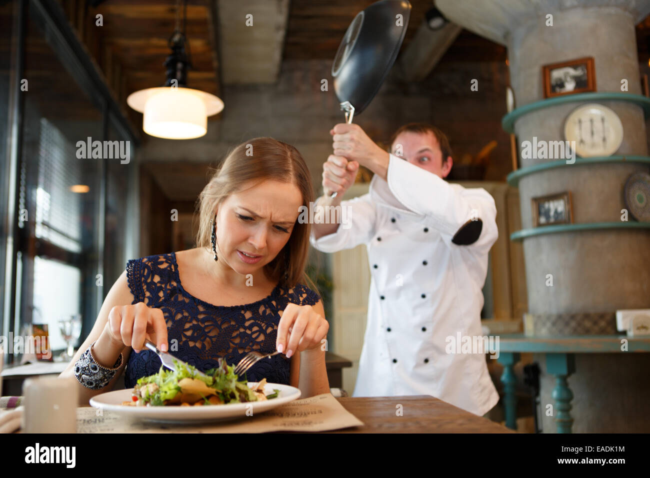 annoying guest and chief's pan Stock Photo - Alamy