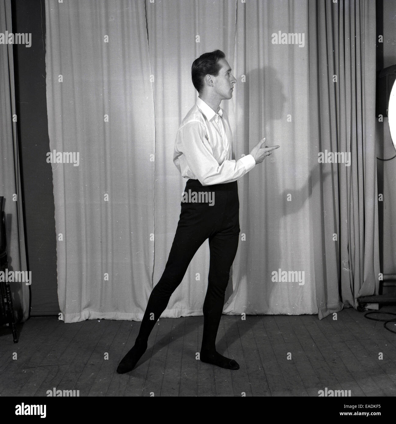1950s, Historical picture of a slim male ballet dancer practising his ...