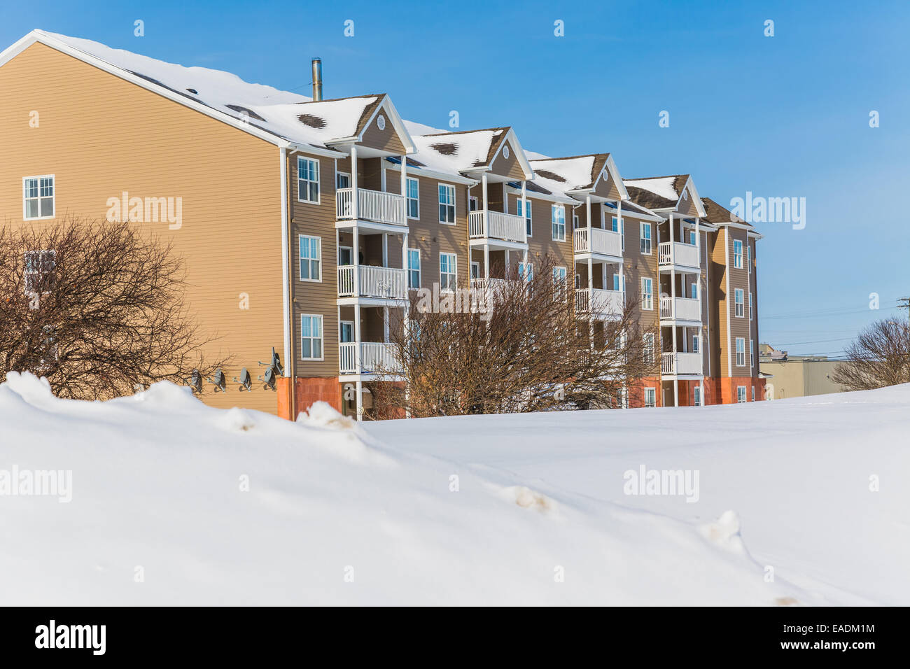 Apartment building after a snow storm Stock Photo - Alamy