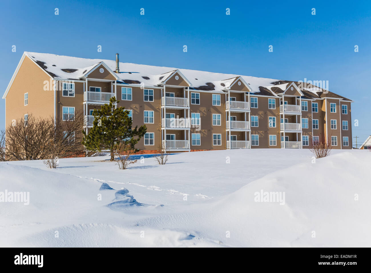 Apartment building after a snow storm Stock Photo - Alamy