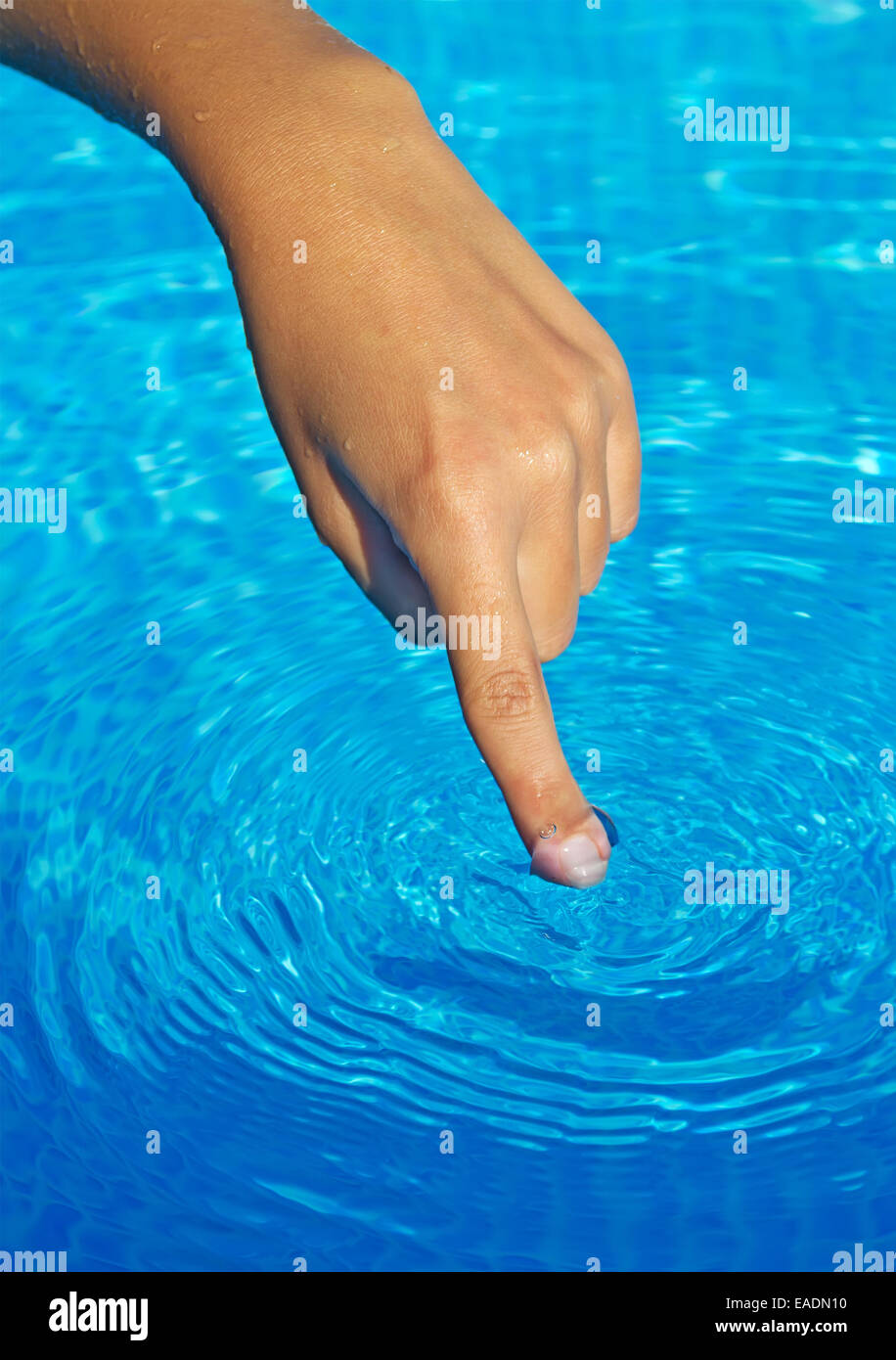 human hand in a swimming pool Stock Photo - Alamy