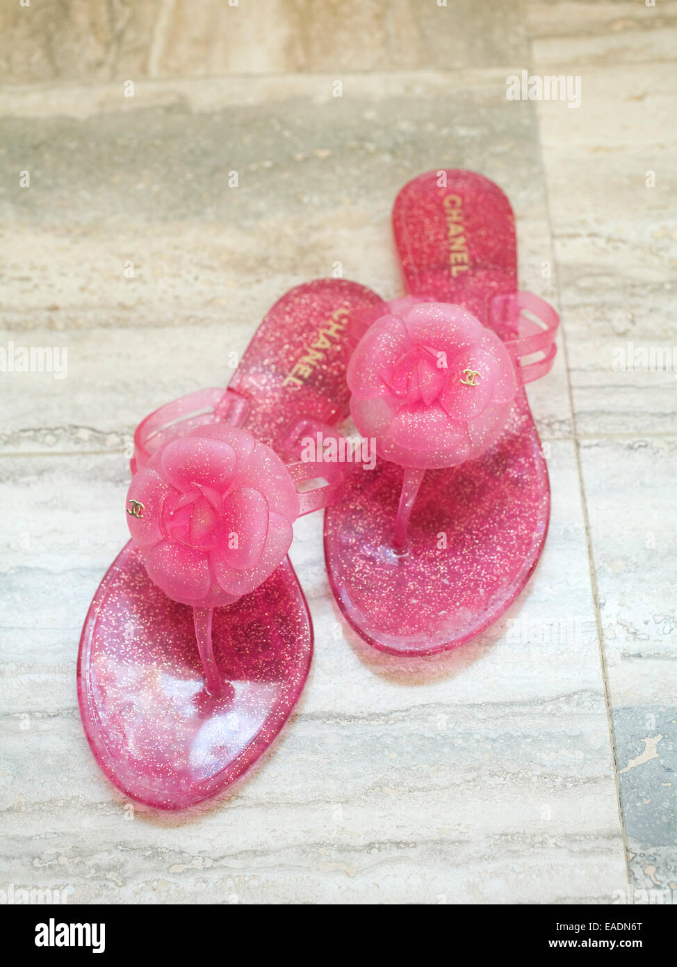 Pink Flip Flops on marble floor, Miami Beach, Florida Stock Photo - Alamy