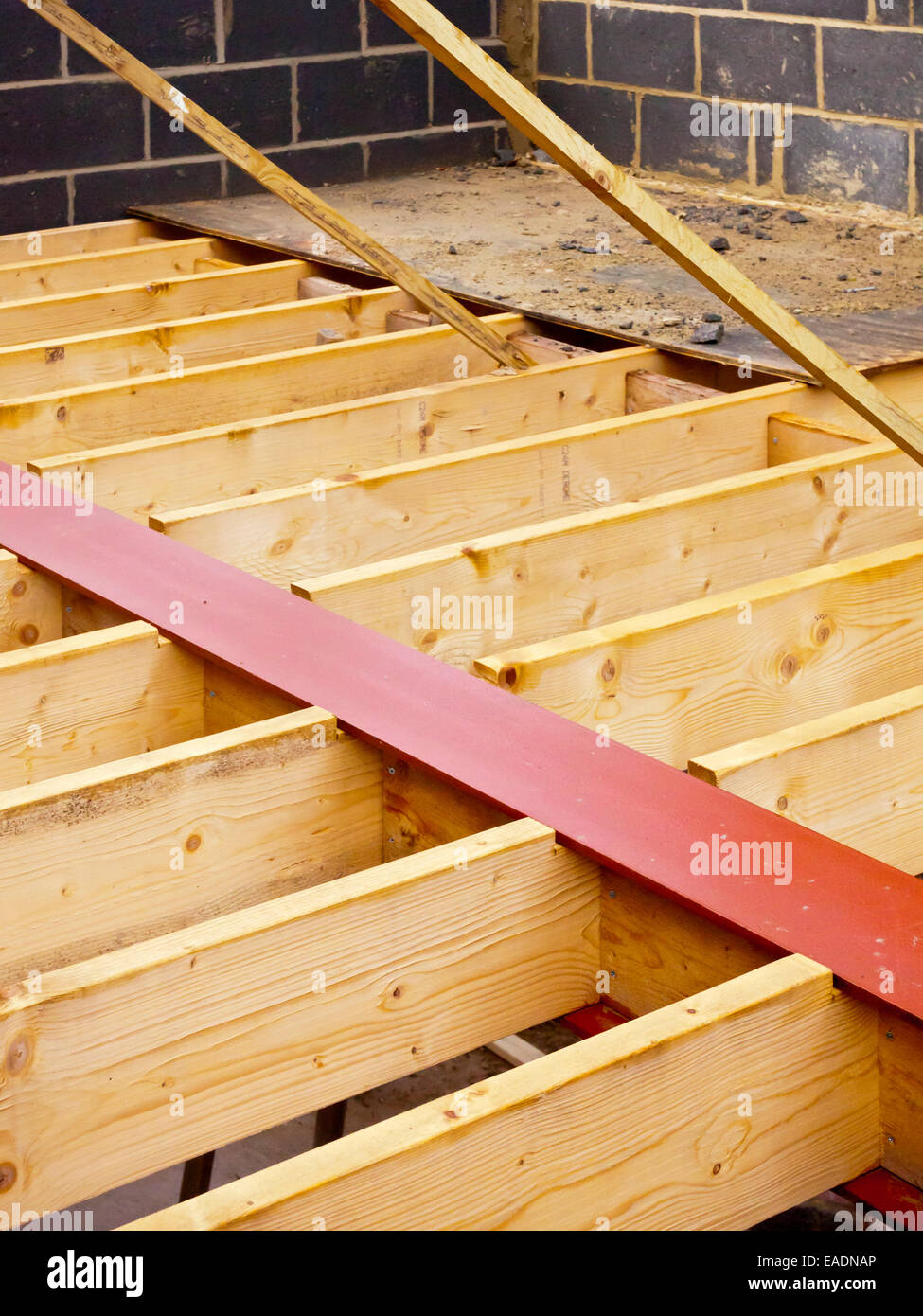 Detail of wooden roof beams on a building site where a new house is ...