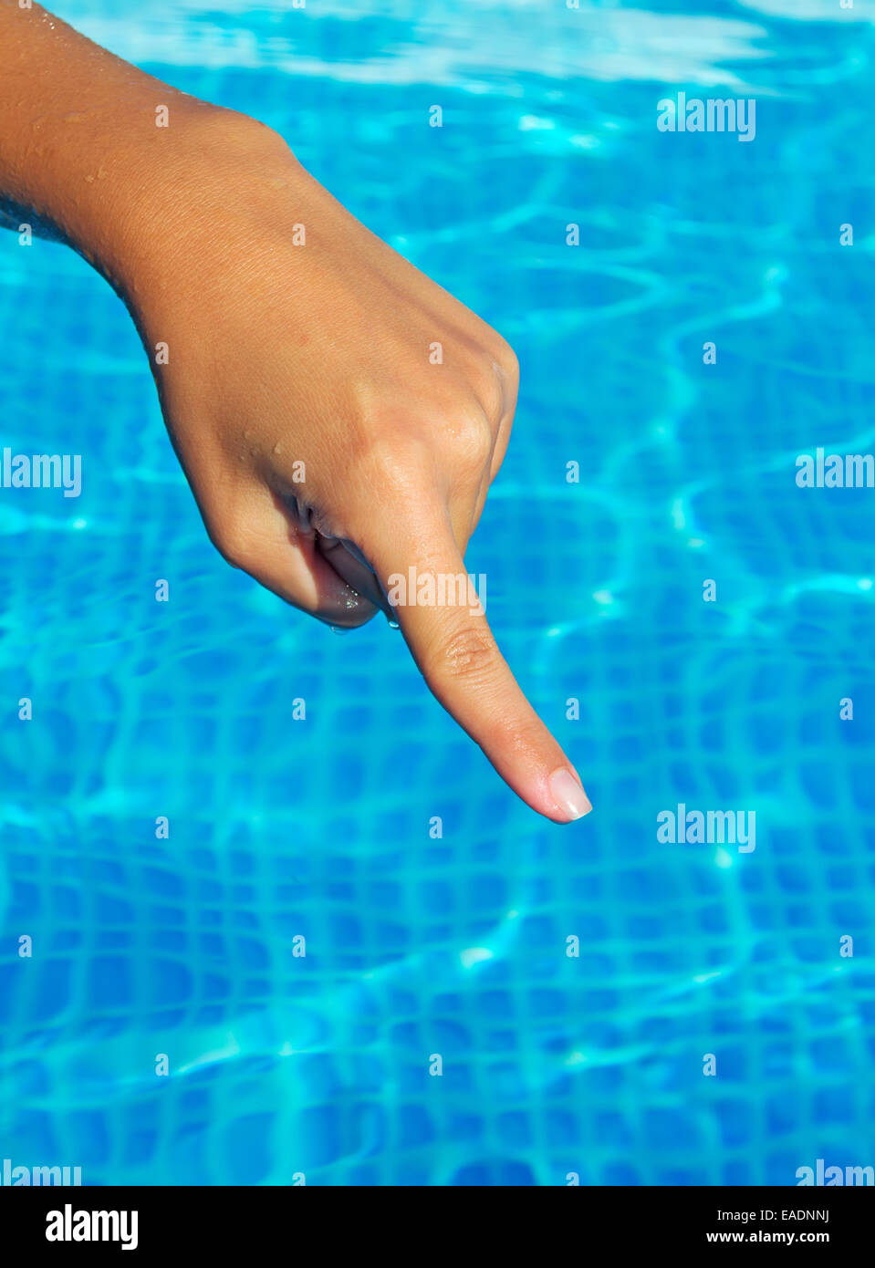Checking water temperature swimming hi-res stock photography and images ...