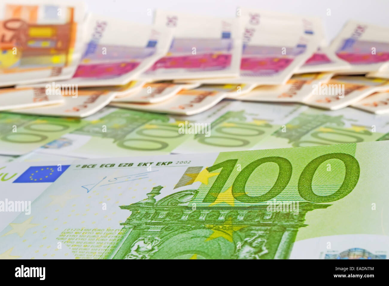 different euro banknotes on a table Stock Photo - Alamy