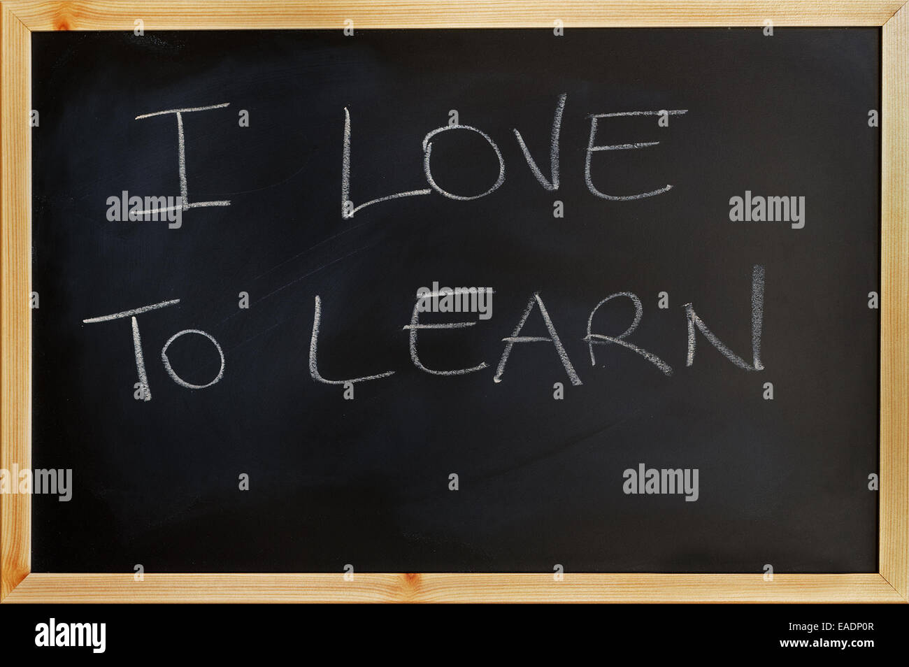 i love to learn written on a blackboard Stock Photo - Alamy