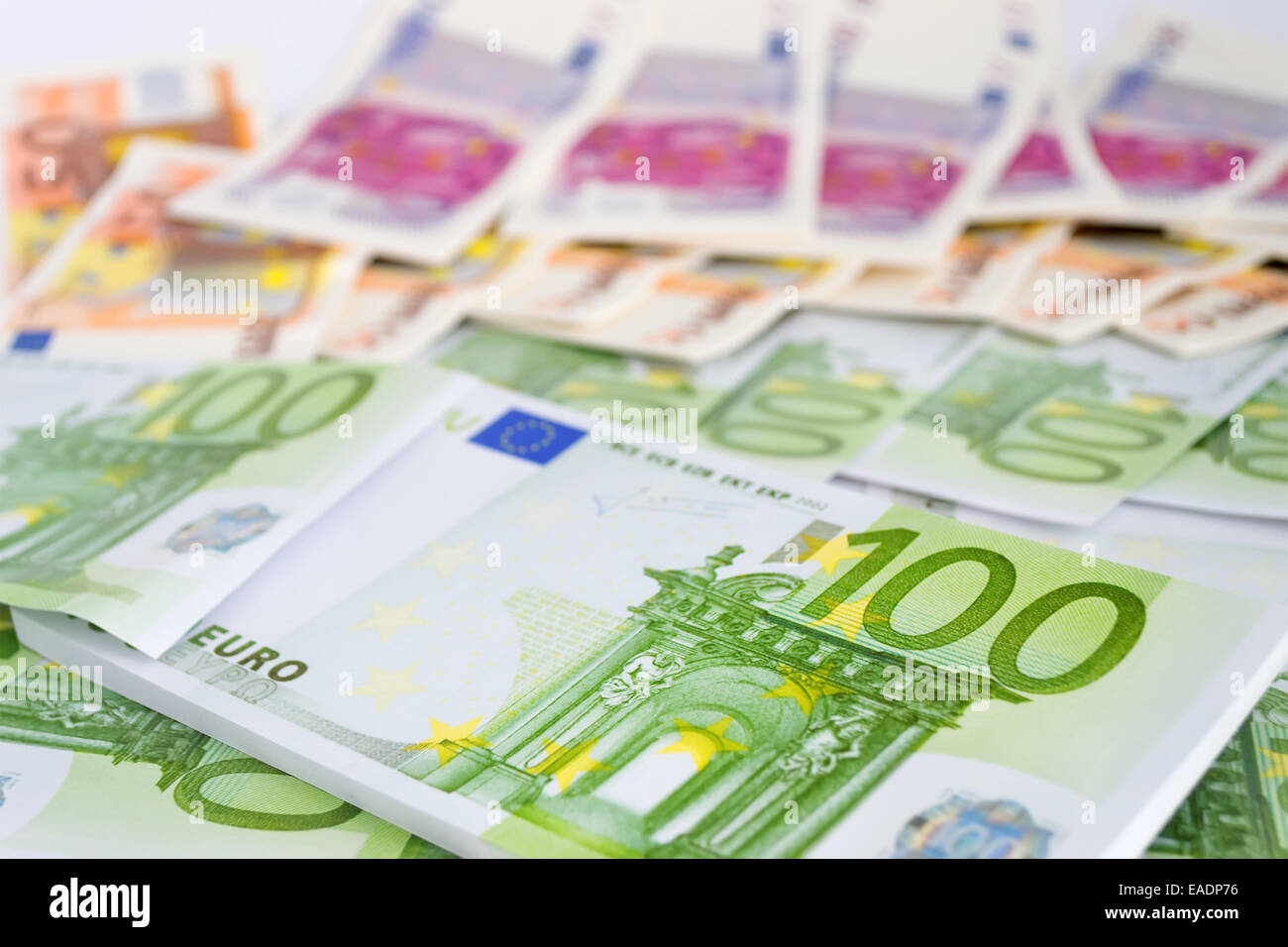 different euro banknotes on a table Stock Photo - Alamy
