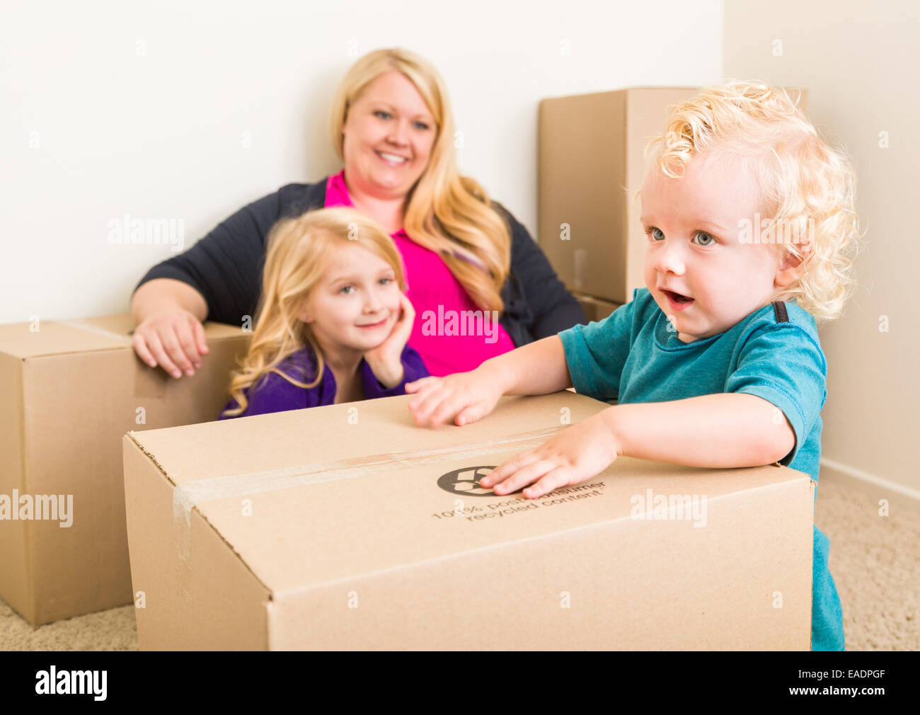 Children playing with boxes hi-res stock photography and images - Alamy