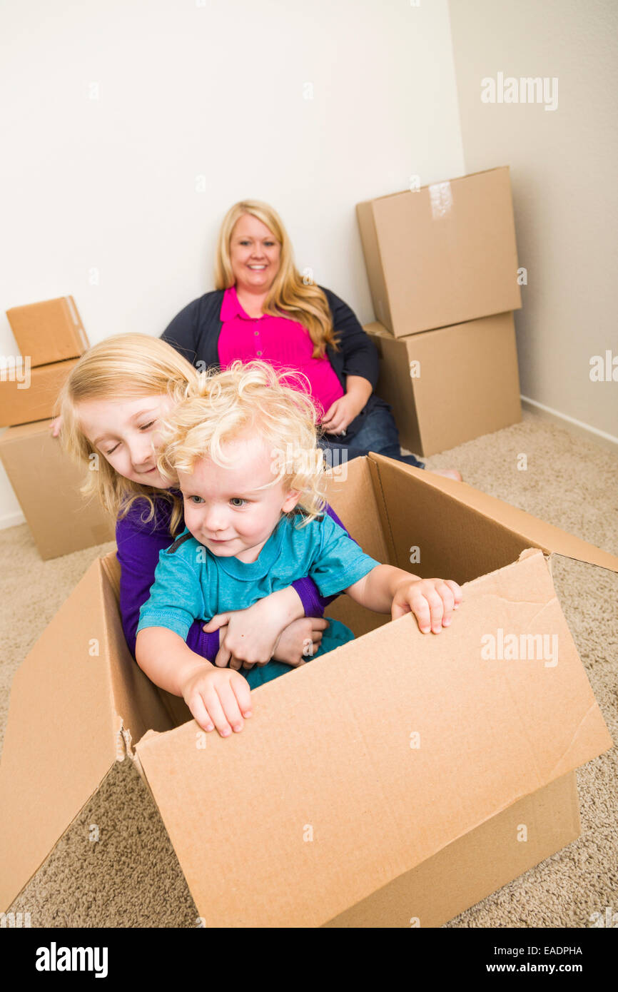 Children playing with boxes hi-res stock photography and images - Alamy