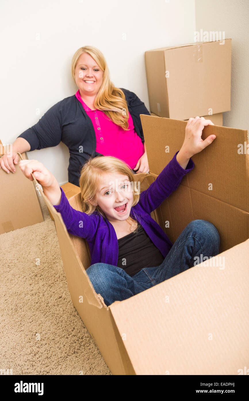 Children playing with boxes hi-res stock photography and images - Alamy