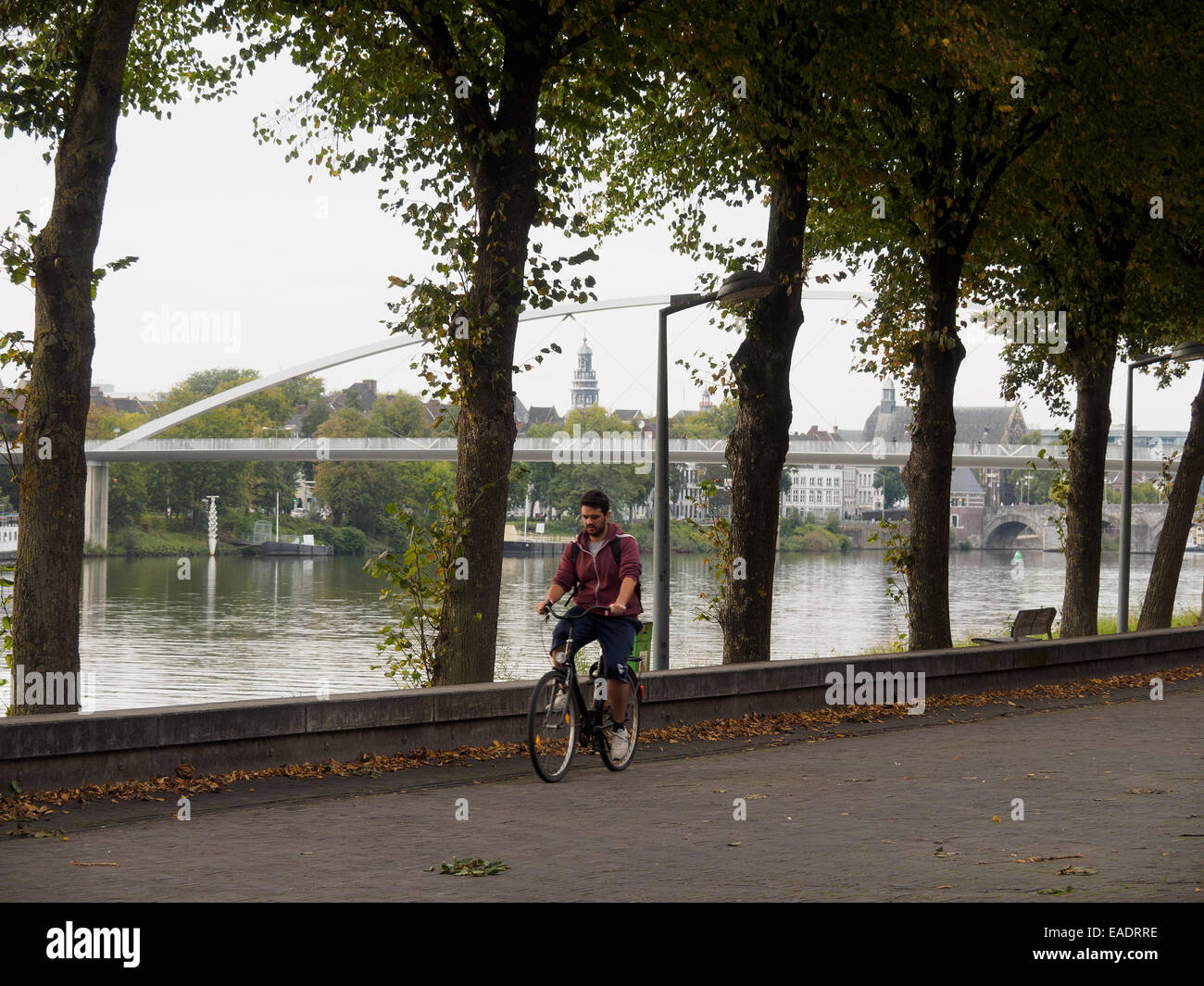 Person riding a bicycle hi-res stock photography and images - Alamy
