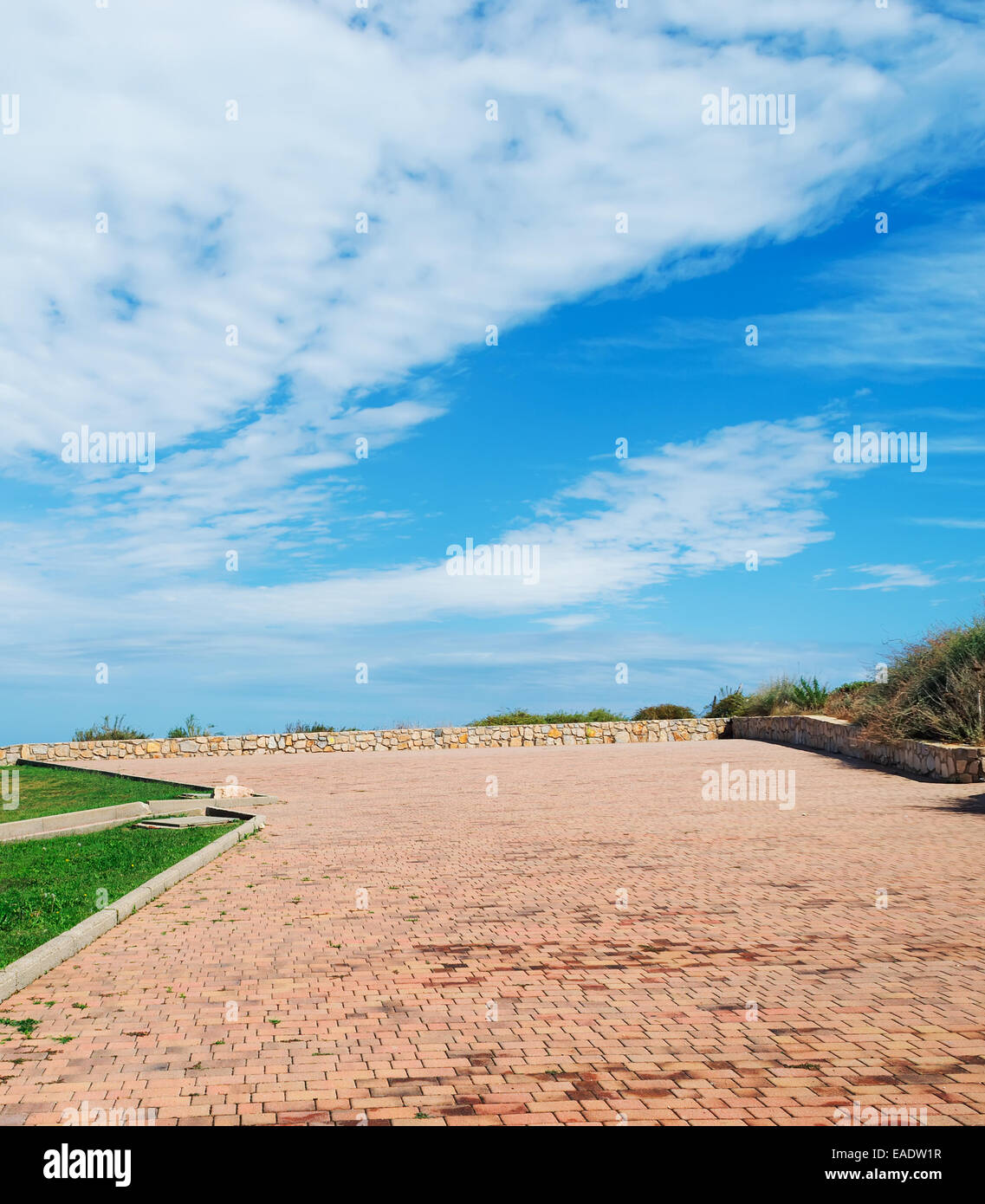paved walk path by the shore in Sardinia Stock Photo - Alamy