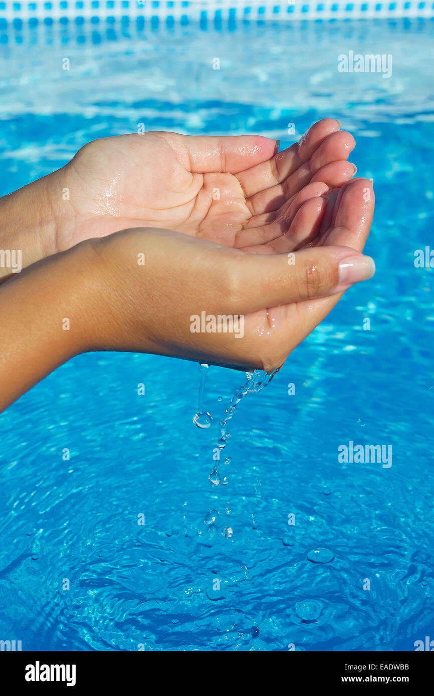Swimming pool splashing hand hi-res stock photography and images - Alamy