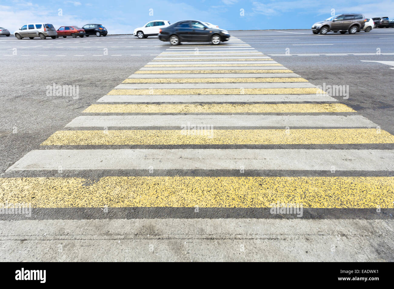 yellow and white crossing zebra of pedestrian crosswalk on road Stock ...