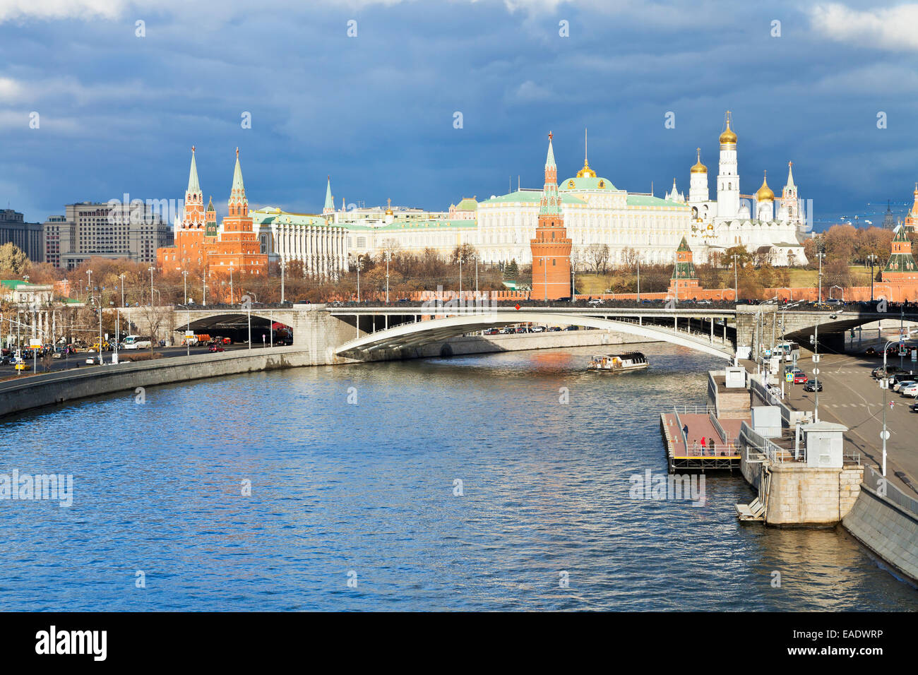 dark blue clouds over illuminated Moscow Kremlin and Moskva River in ...