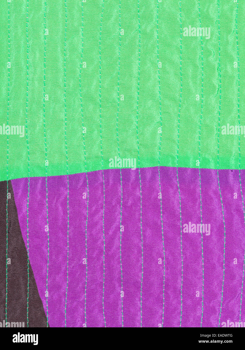 patchwork textile background from stitched silk fabric close up Stock ...