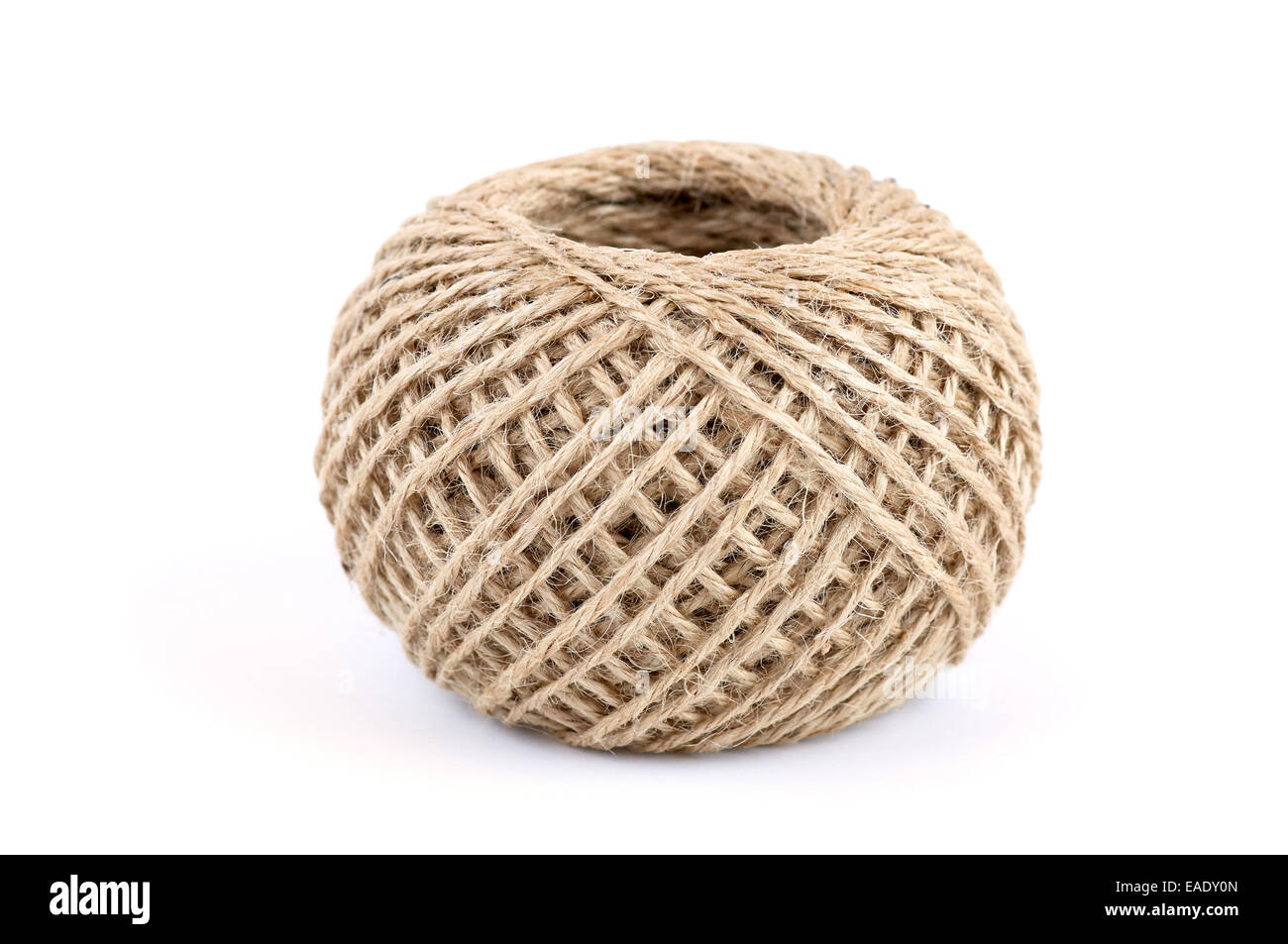 Clew of natural rope isolated over white background Stock Photo - Alamy