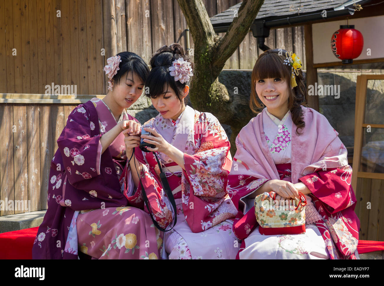 Modern Japanese girls wearing traditional kimono. Picture taken in ...