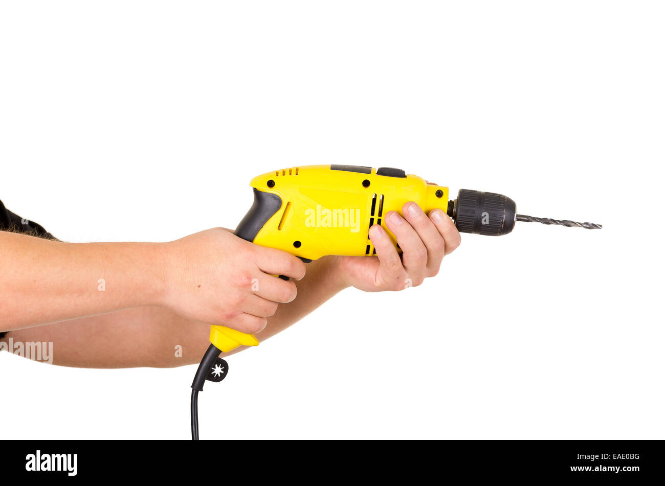 hand holding electric yellow drill tool Stock Photo - Alamy