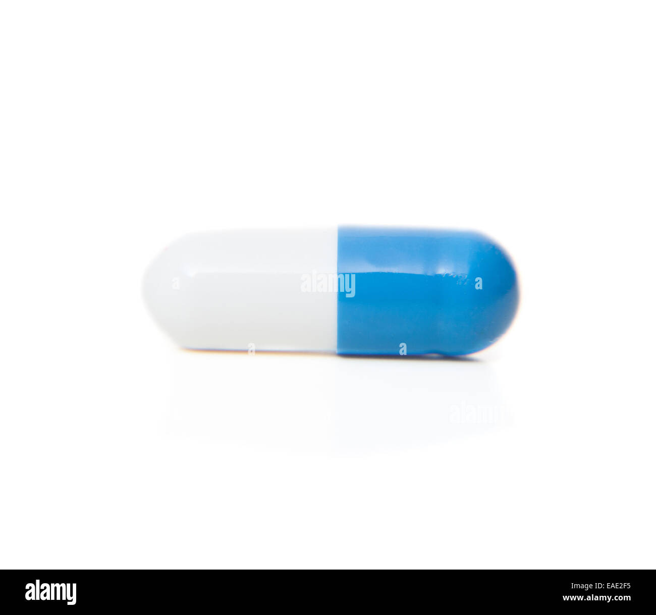 Single pill. All on white background Stock Photo - Alamy
