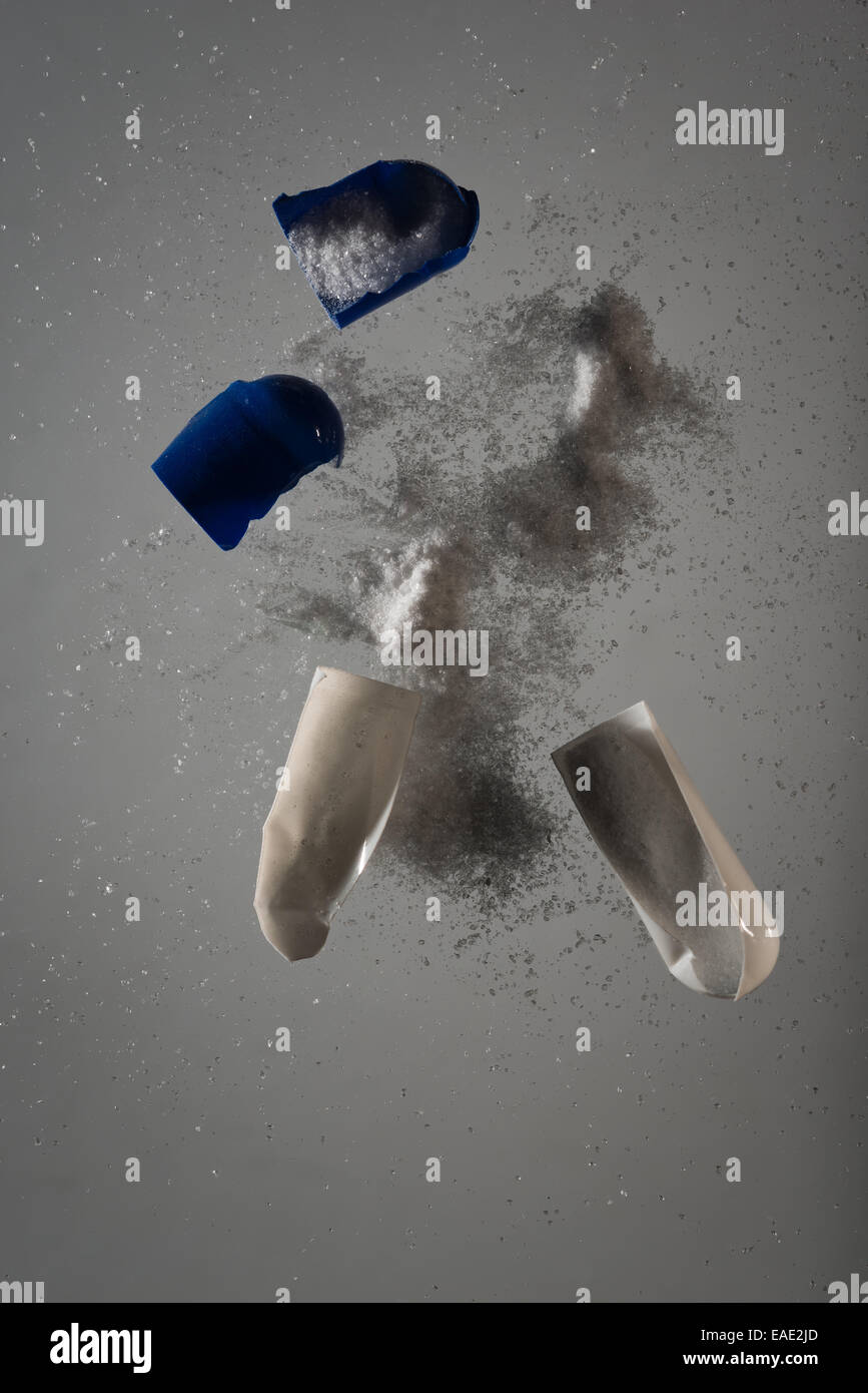 Pain relief contents of broken drug capsule scattered out revealing ...
