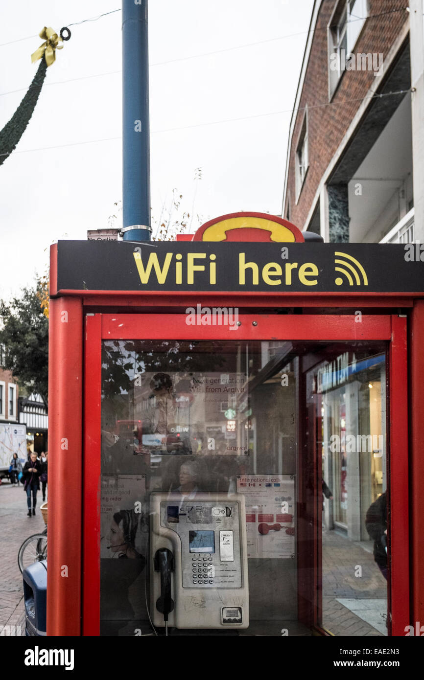 Telephone kiosk with a sign above advertising 'WiFi here' Stock Photo ...