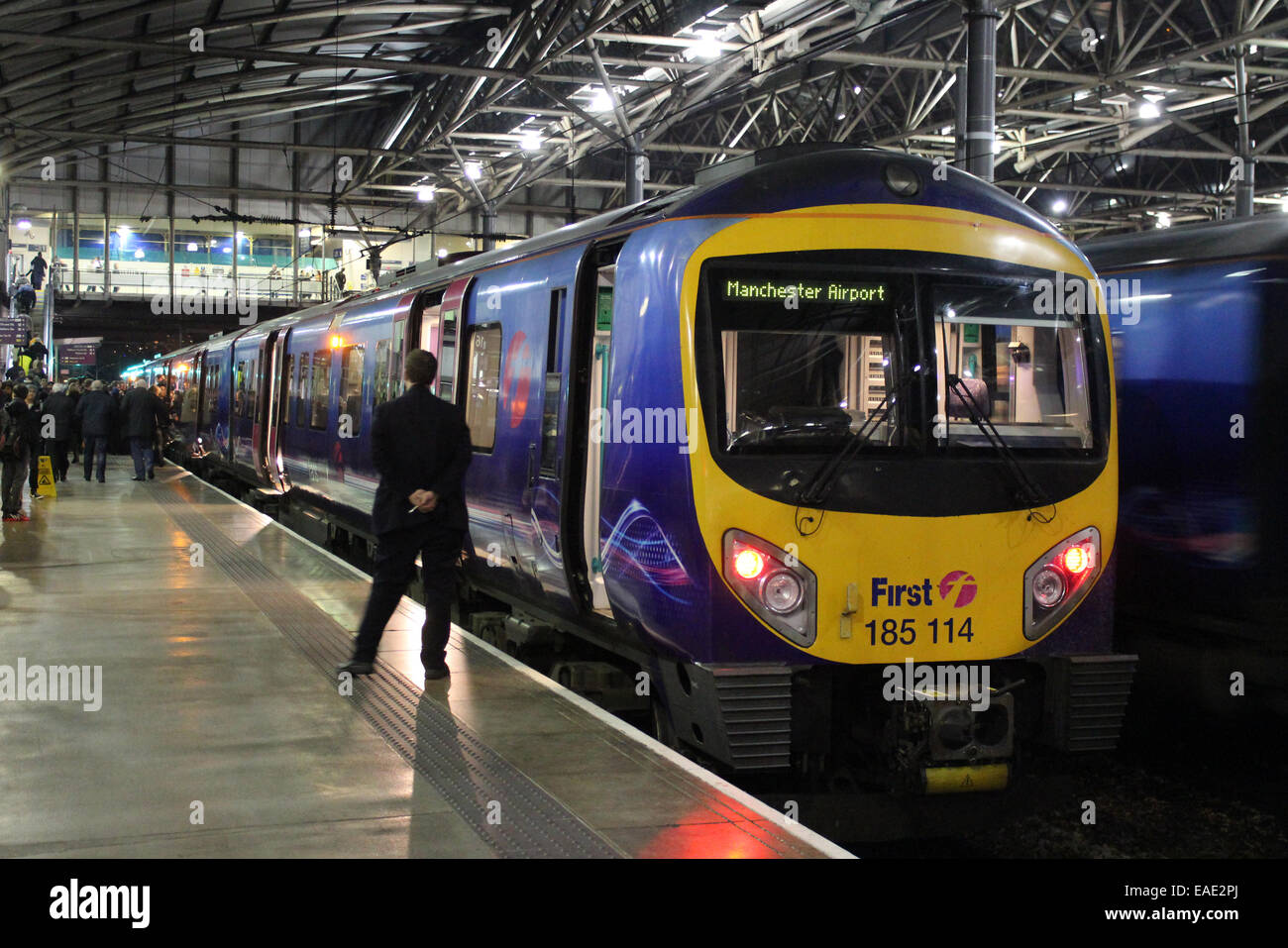 Class 185 diesel multiple unit train at a platform in Leeds railway ...