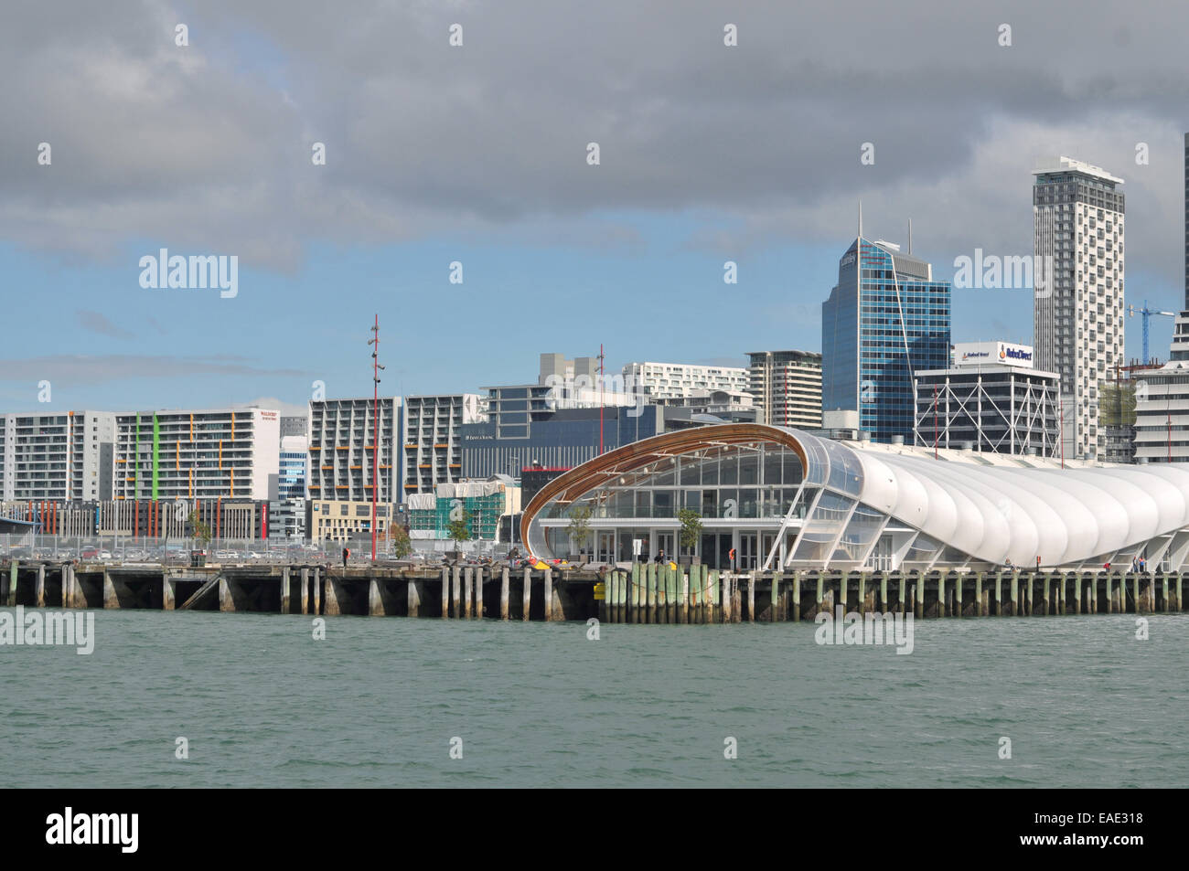 Auckland downtown from sea showing commercial wharves and The Cloud ...