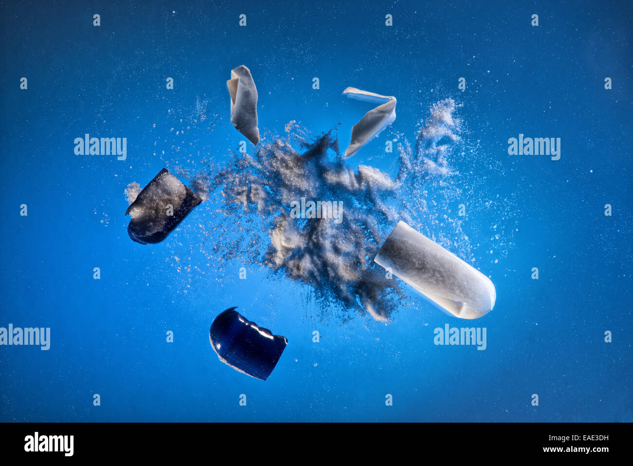 Pain relief contents of broken drug capsule scattered out revealing ...