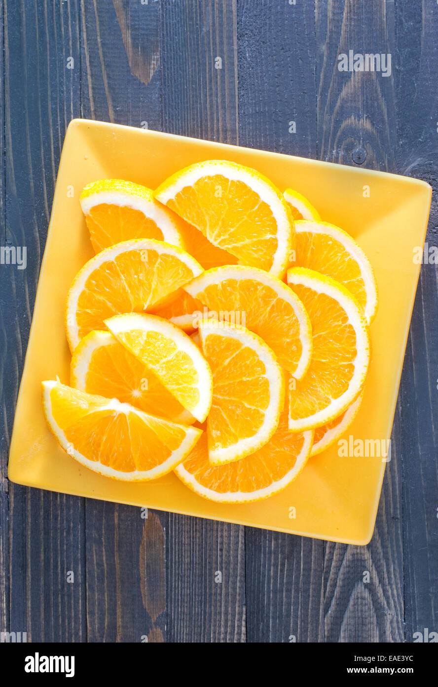 orange on plate Stock Photo - Alamy