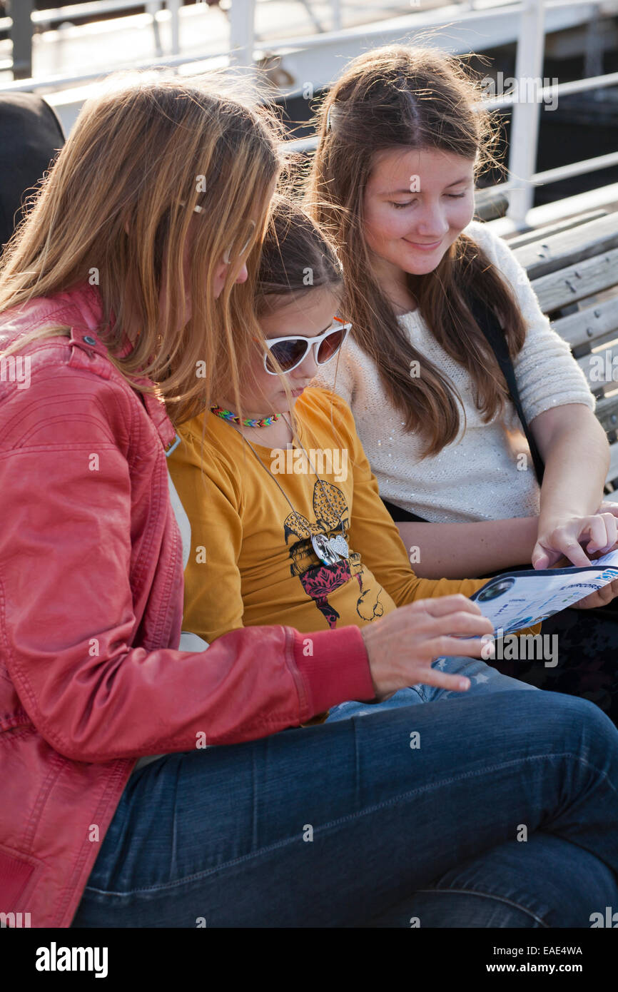 Girls relaxing outdoors Stock Photo - Alamy