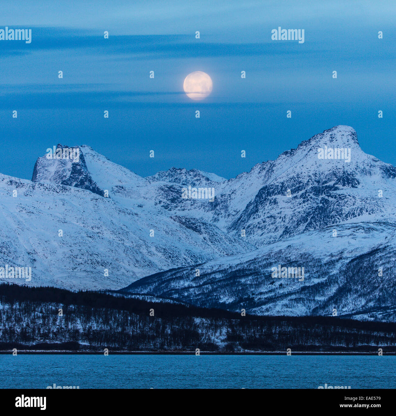 Full Moon Over The Mountains Stock Photo - Alamy